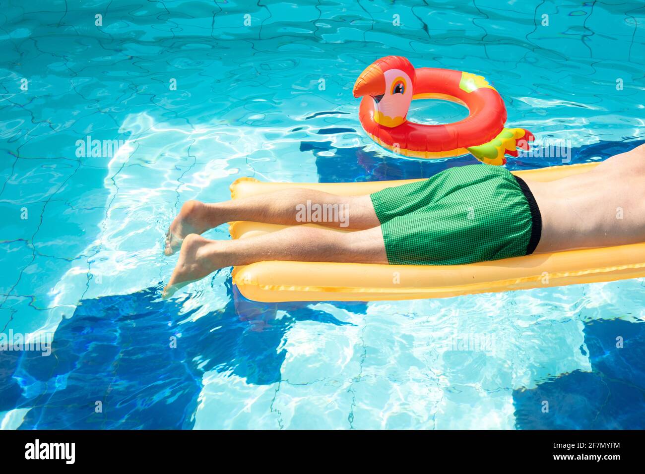 Man floater pool hi-res stock photography and images - Alamy