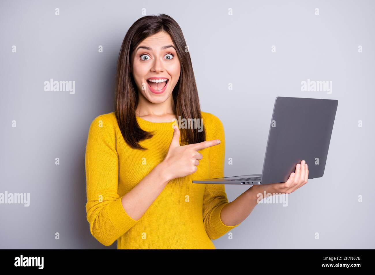 Photo of hooray brunette nice lady hold point laptop wear eyewear ...