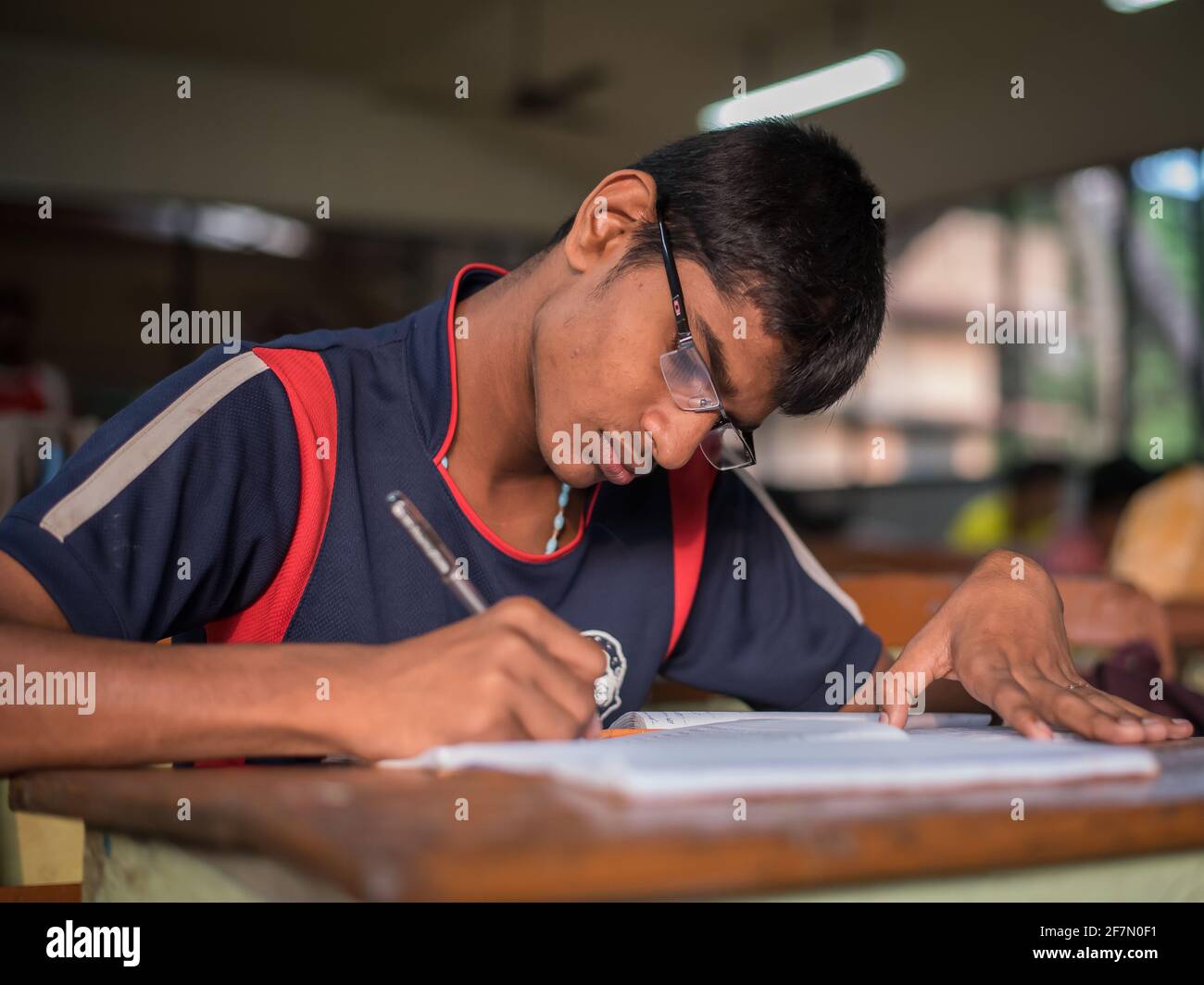 Adolescent male with glasses hi-res stock photography and images - Alamy