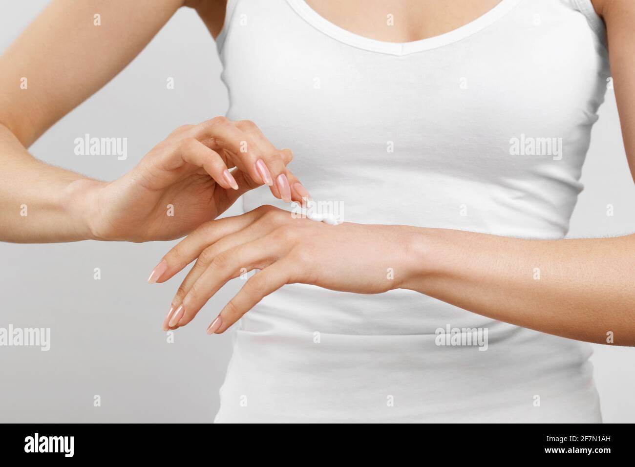 beautiful woman hands with cream.woman hands applying moisturizing ...