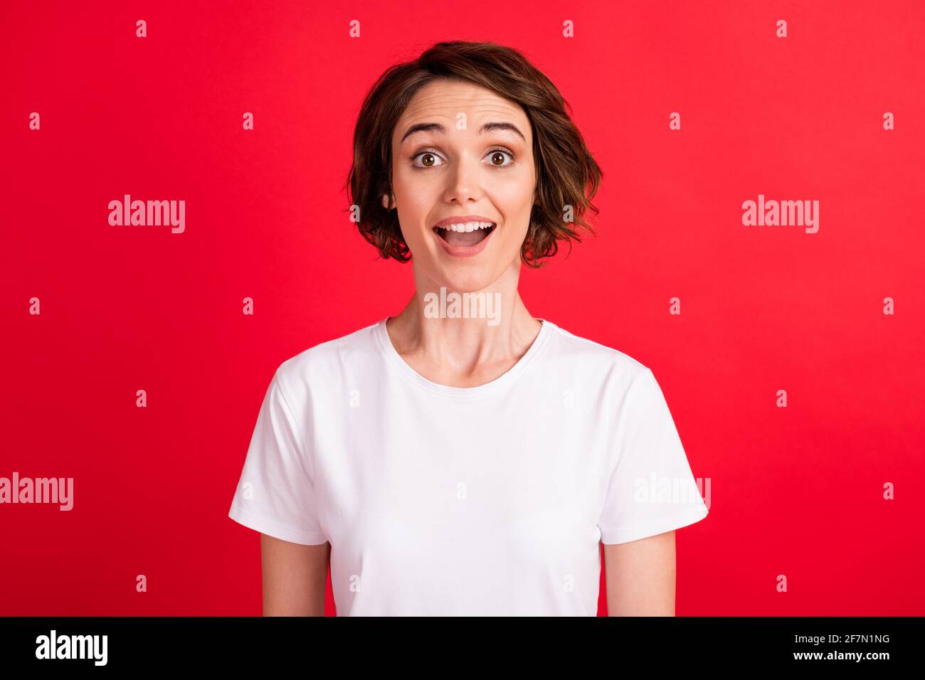 Portrait of attractive amazed glad cheerful girl good news reaction ...