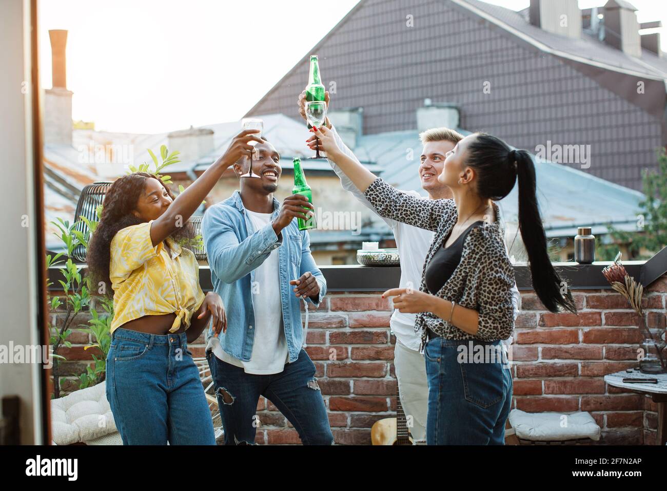 Female friends dancing rooftop party hi-res stock photography and ...