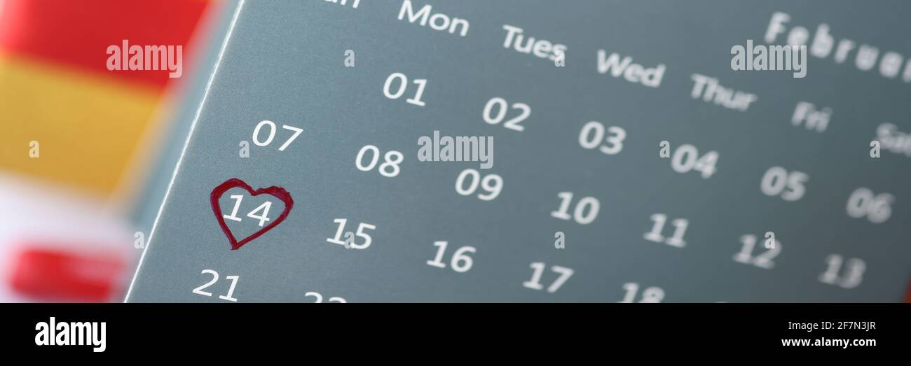 February 14 is marked with heart in calendar Stock Photo - Alamy