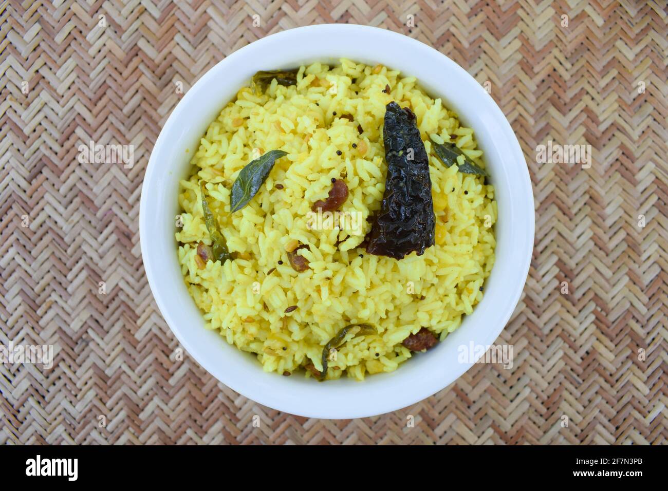 Mango rice also known as Pulihora in South india, prepared with chawal ...