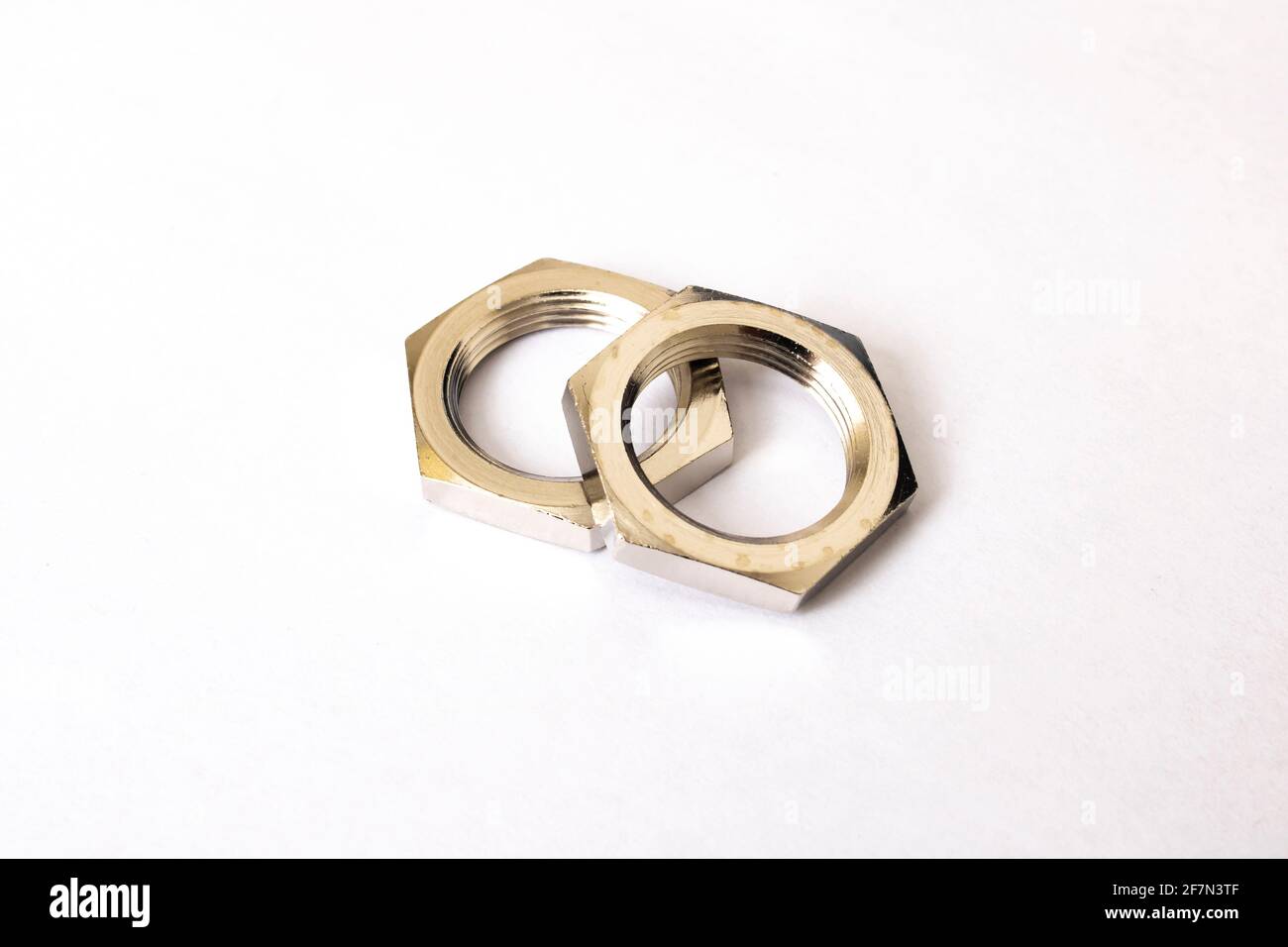 Two large female screw isolated on white background close up Stock ...