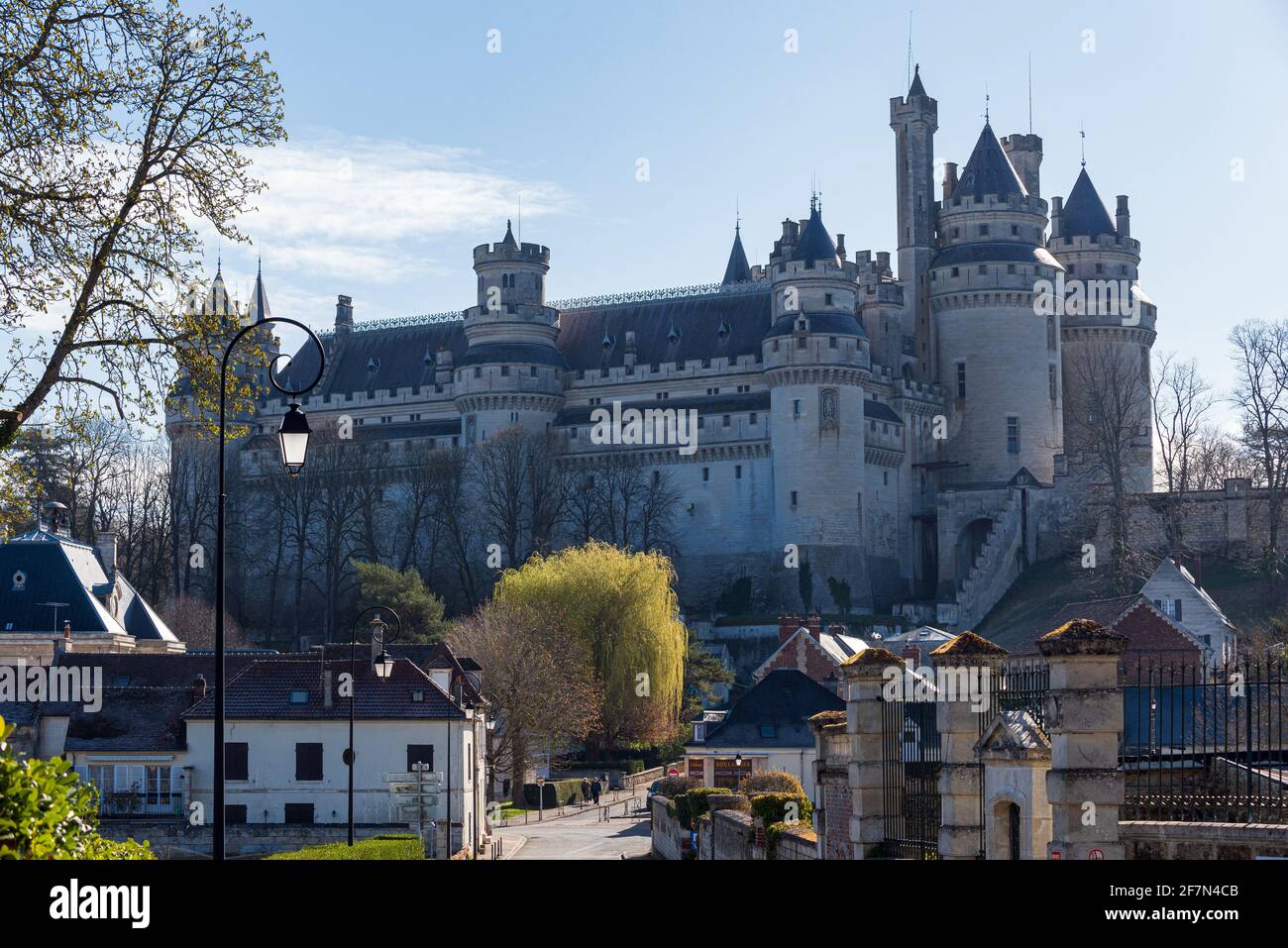 The Castle of Pierrefonds is an imposing fortress located at the edge ...