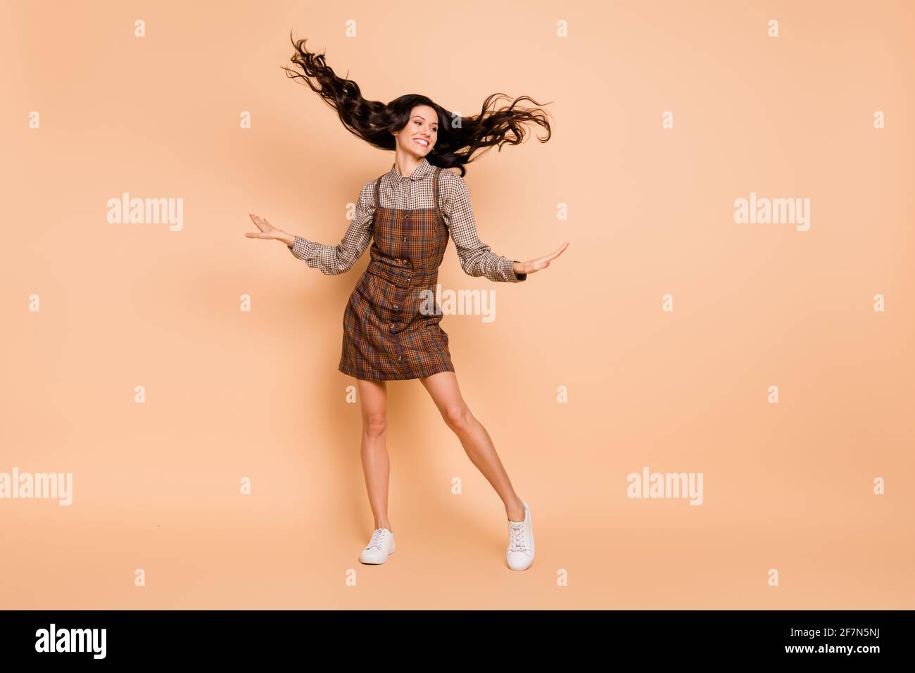 Full length body size view of attractive cheery wavy-haired girl ...