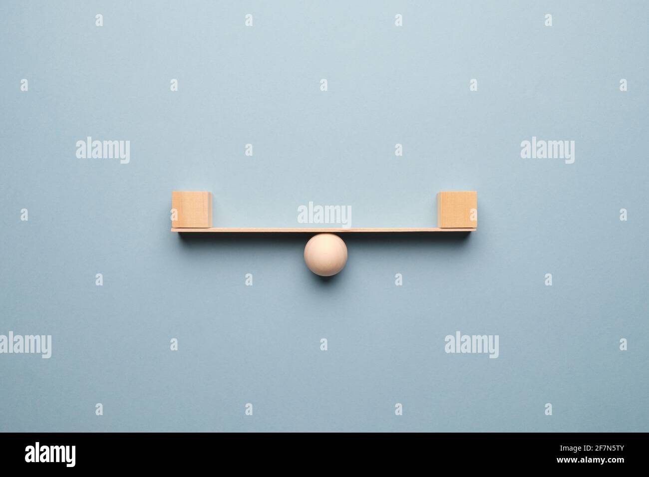 Abstract concept of balance with wooden walls Stock Photo - Alamy