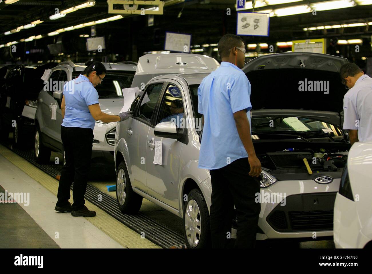 salvador, bahia / brazil - december 12, 2013: employees are seen at ...