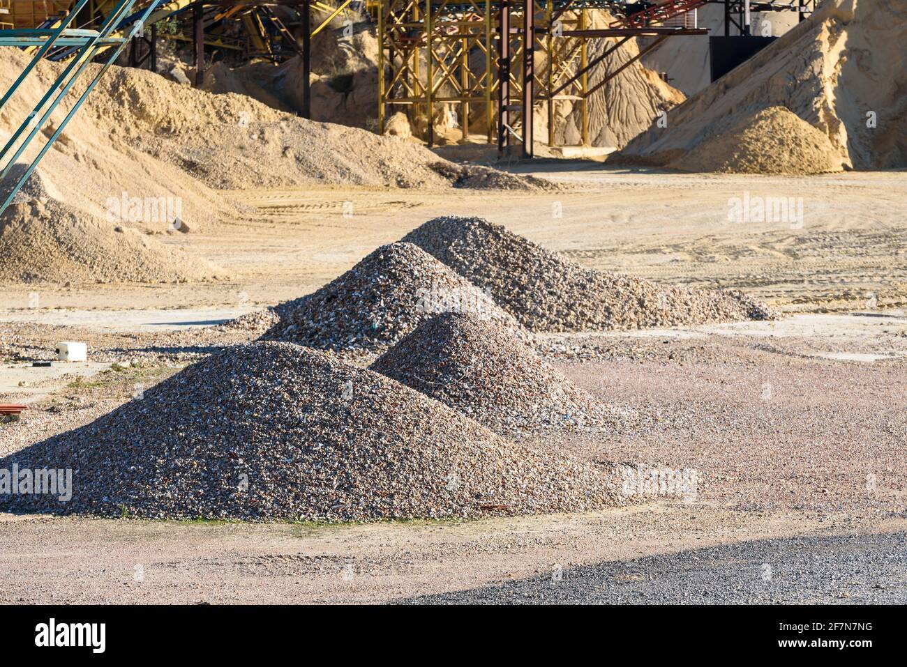 Pile of gravel and sand piled up in a quarry for sale and use in ...
