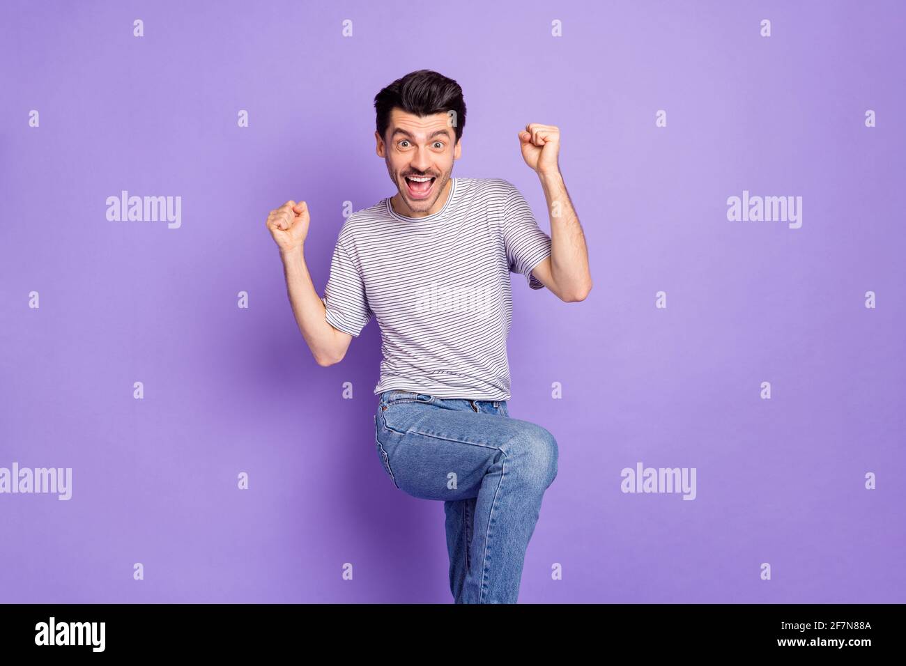 Photo of happy cheerful positive excited crazy man raise fists in ...