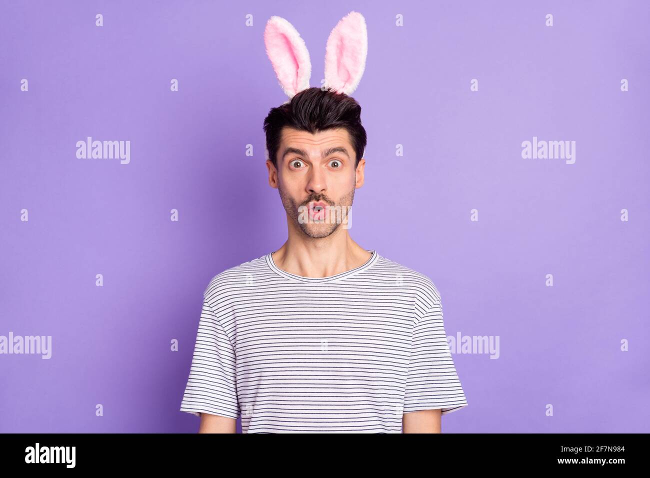 Photo of shocked guy open mouth look camera wear hare ears headband ...