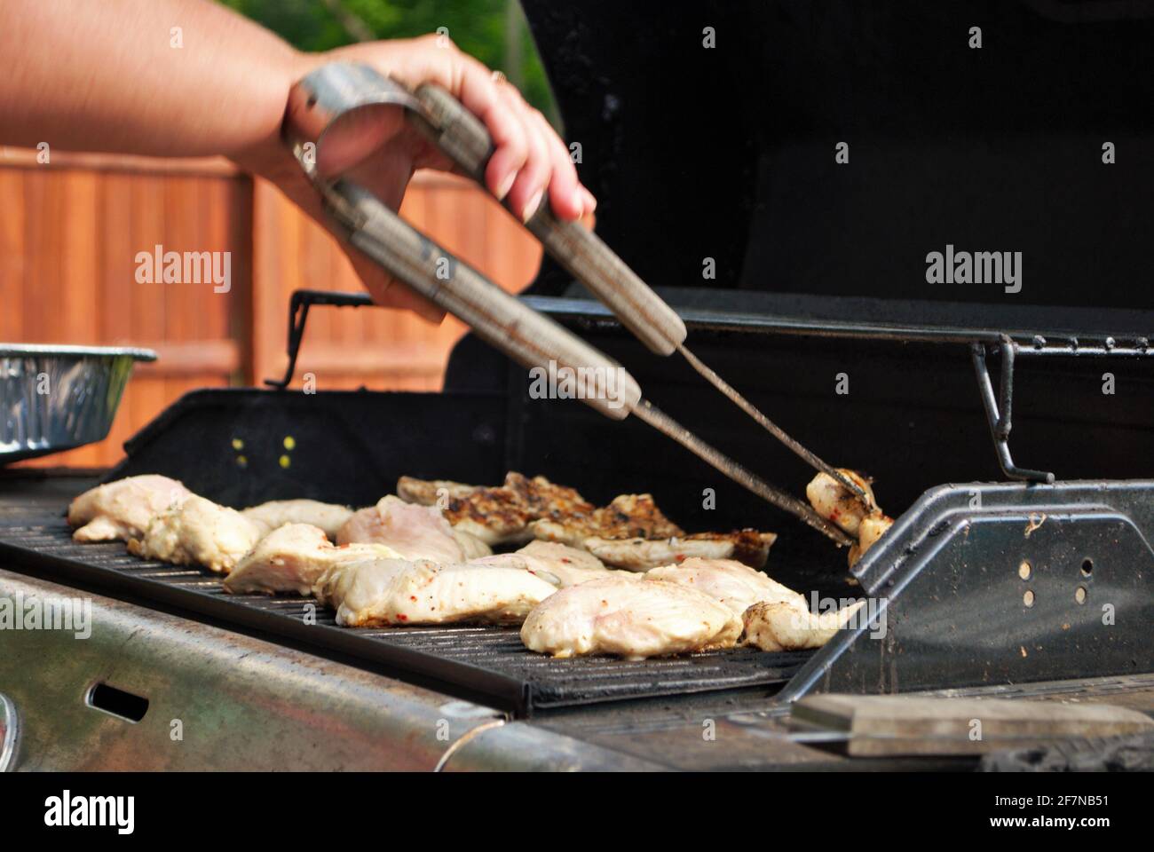 Bbq woman party cooking hi-res stock photography and images - Alamy