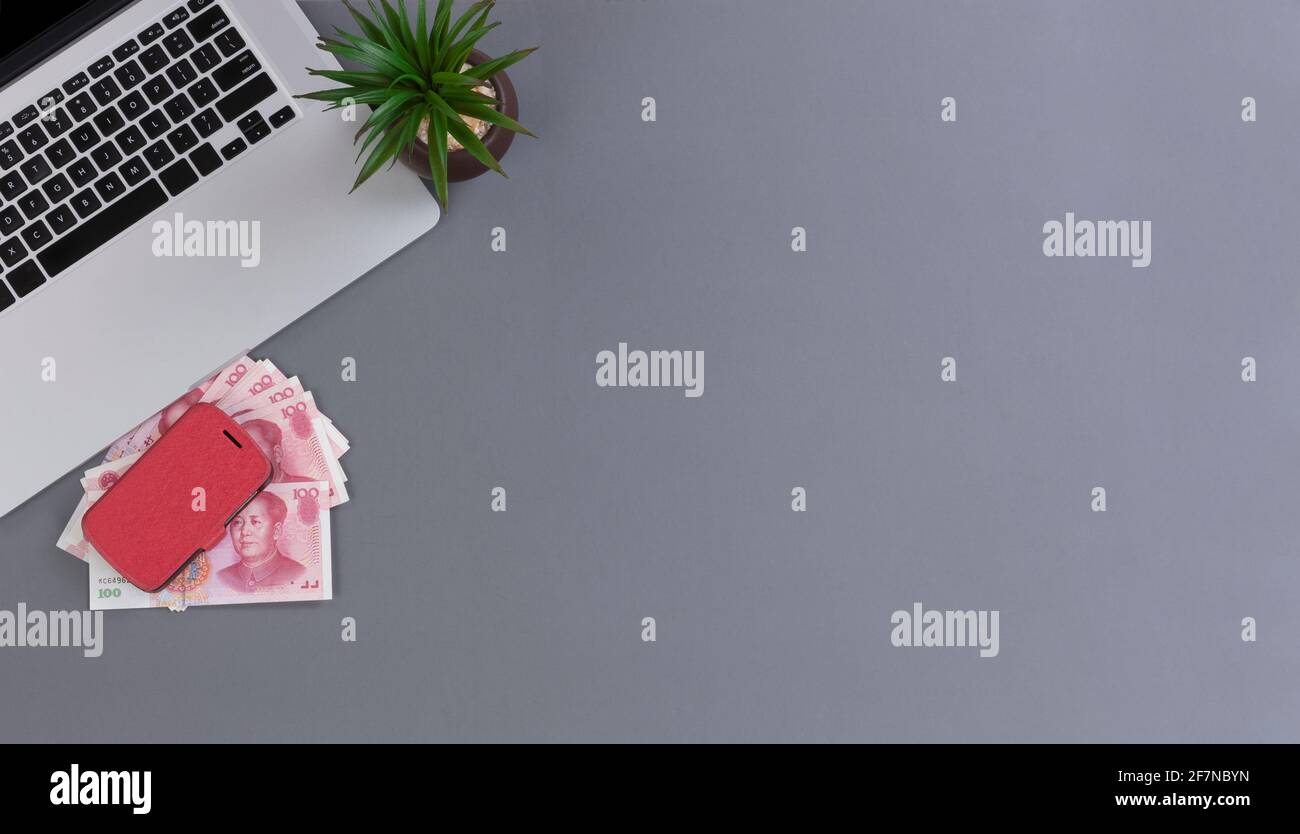 Mobile wireless laptop on top of desktop with smartphone and ...