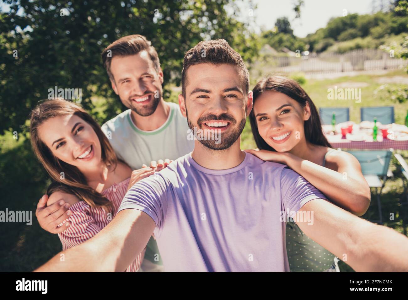 Portrait four happy family members hi-res stock photography and images ...