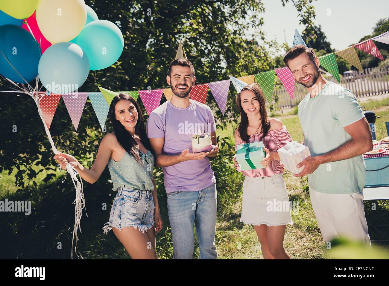 Photo of two cheerful couples buddies celebrating birthday party ...