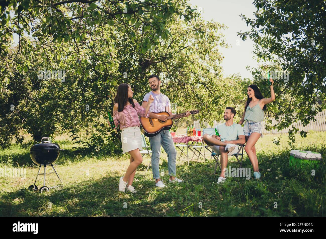 Full body photo of positive couples picnic hold beer bottle weekend ...