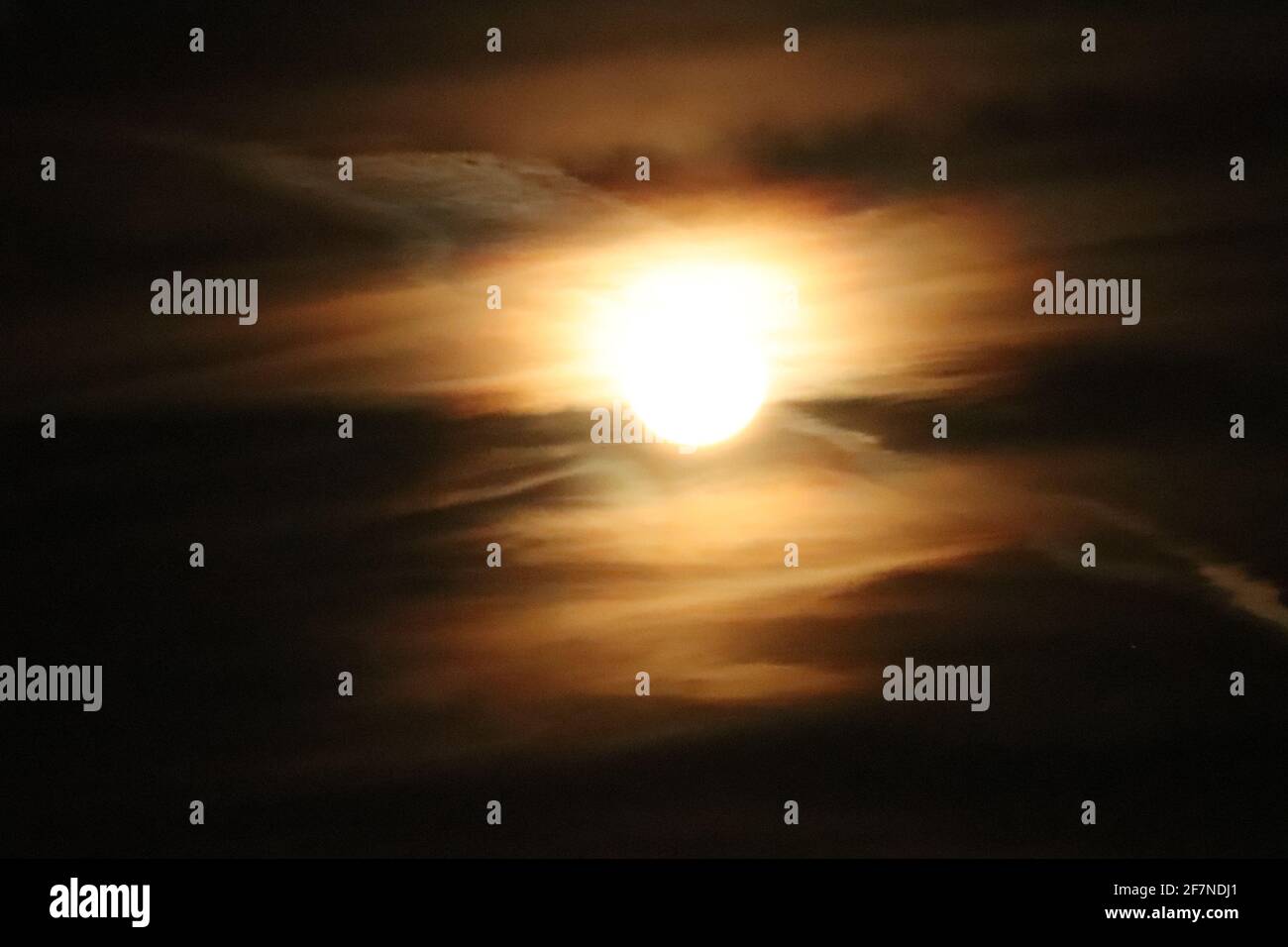 Full moon behind moving cloud hi-res stock photography and images - Alamy