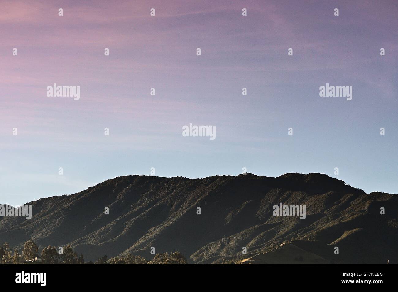 Mountains on sunset Stock Photo - Alamy