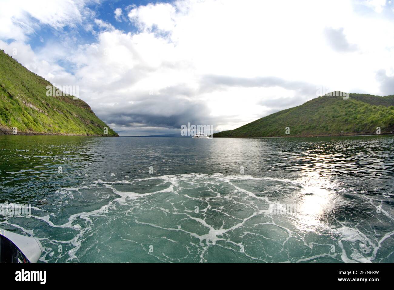 Tagus Cove, with a cruising catamaran in the distance, on Isabela ...