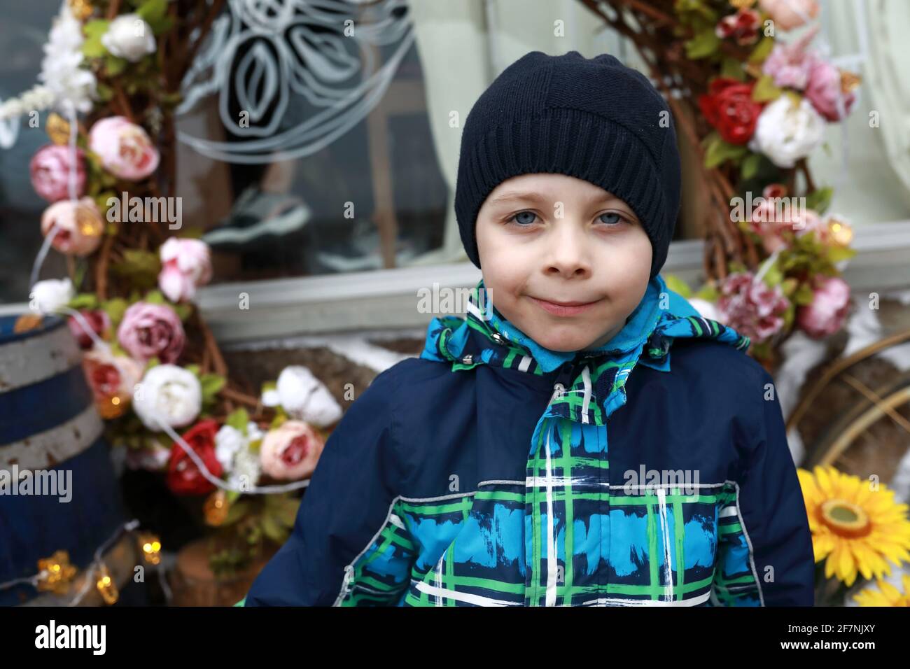 Child on background of decoration of flowers, Gurzuf, Crimea Stock ...