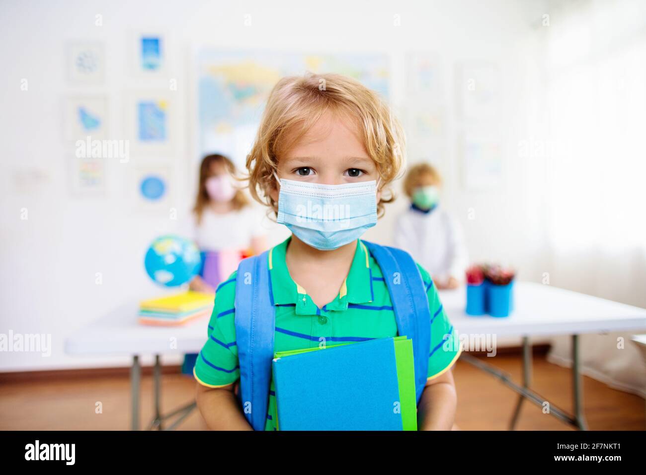 School child wearing face mask during corona virus and flu outbreak ...