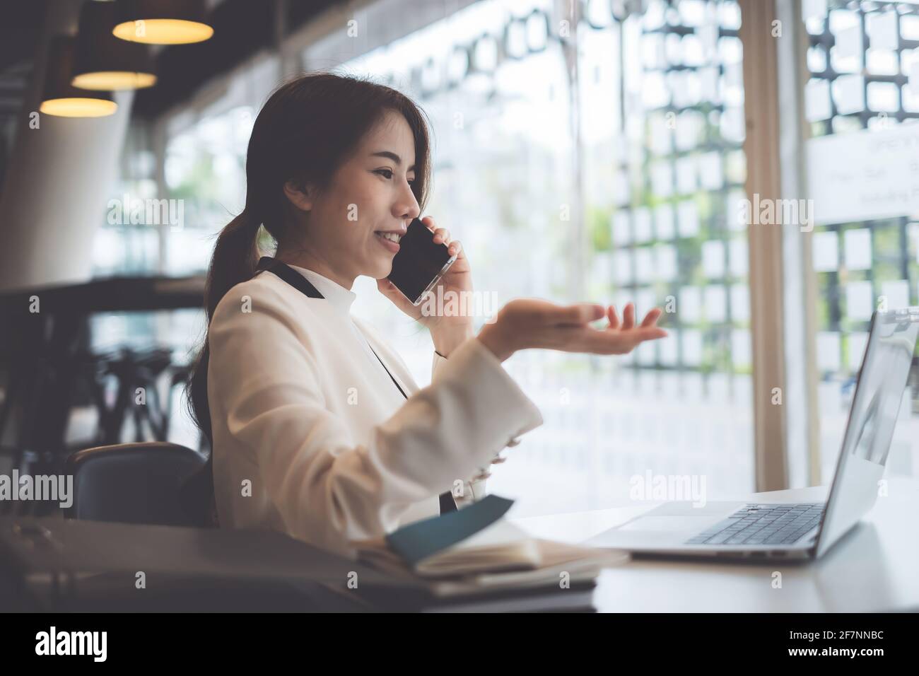 Business coffee shop owner talking with customer and telling cafe is ...