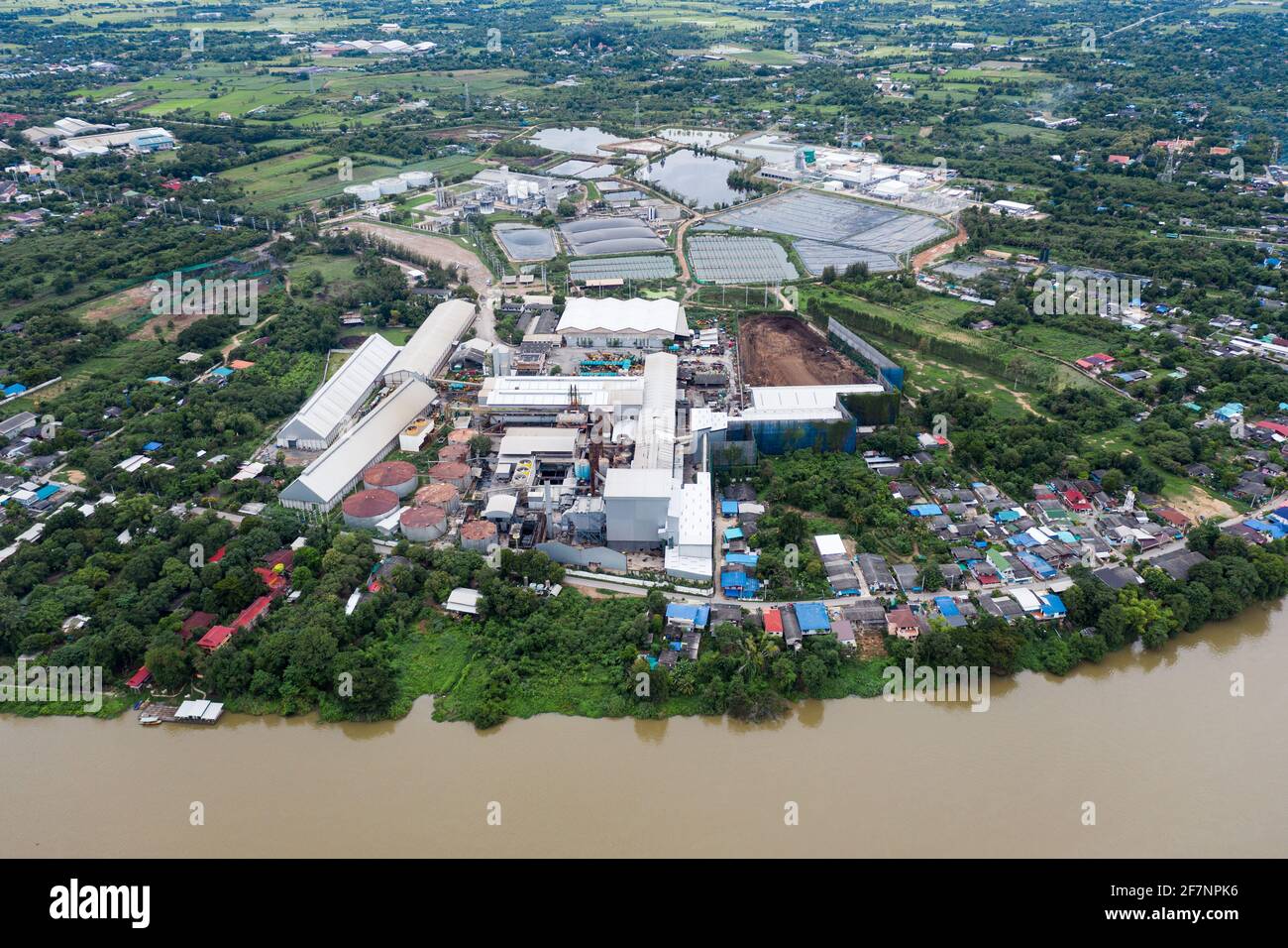 Aerial view of Industrial factory with warehouse, tanks and machine in ...