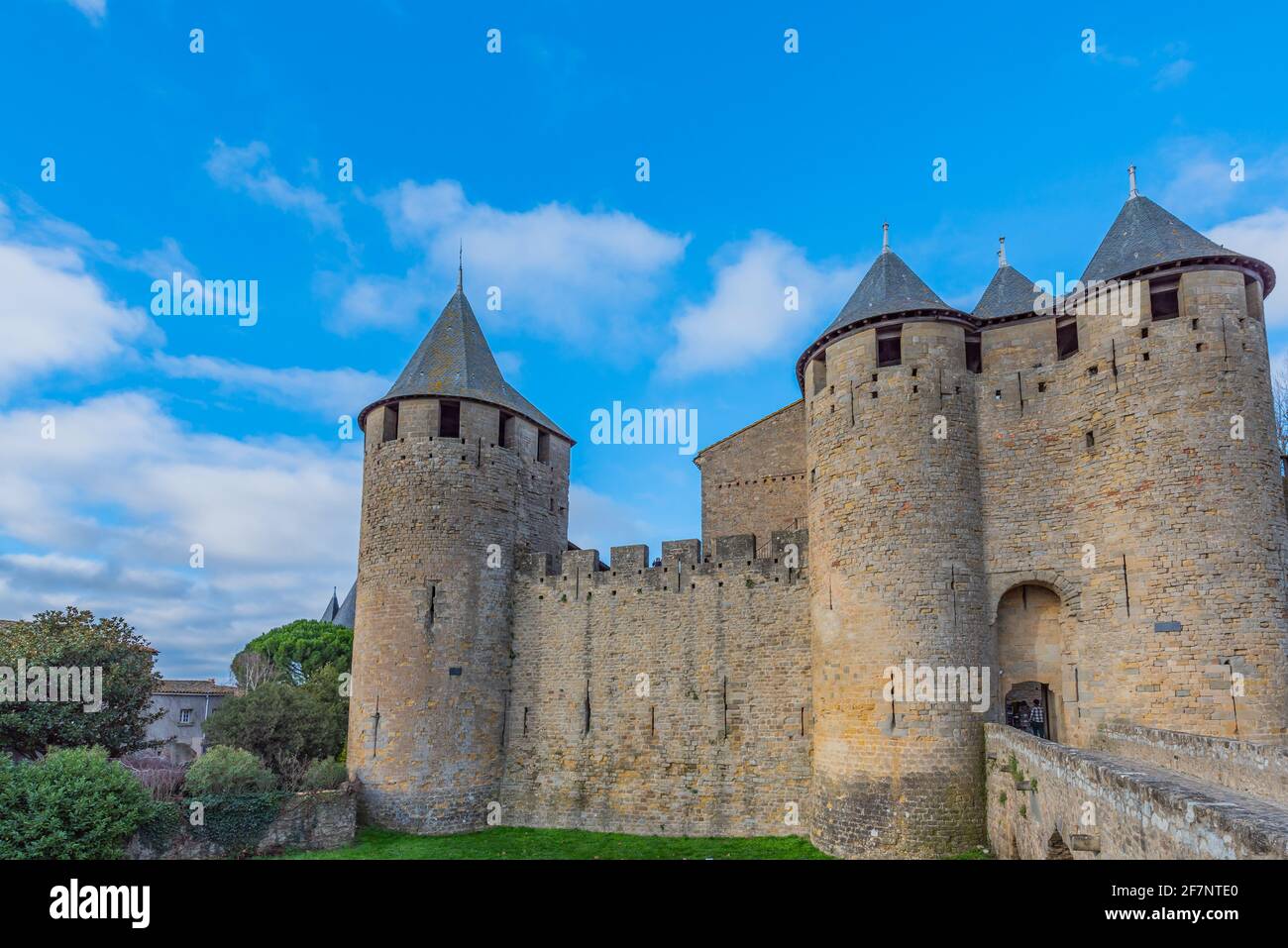 View to the entrance with the bridge from left and the tower ...