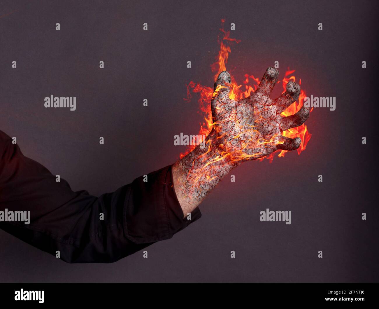 Hand magically burning, black background - Concept of power Stock Photo ...