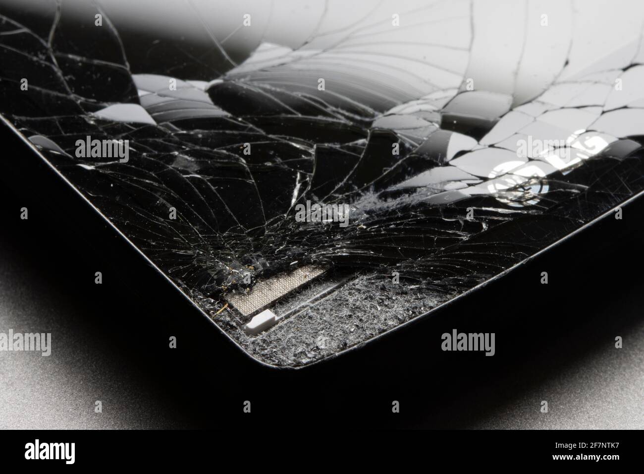 The LG logo is seen on a cracked smartphone on April 8, 2021. LG ...