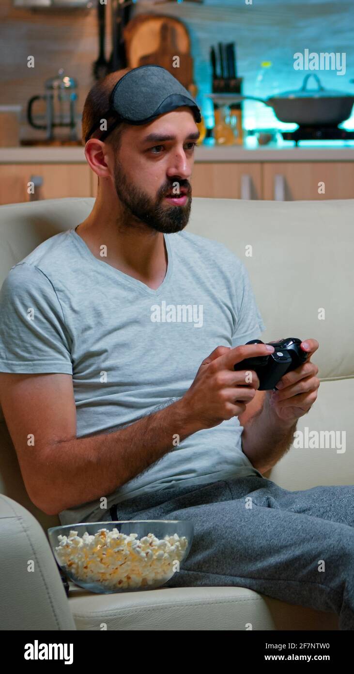 Frustrated pro gamer losing entertainment gaming competition using ...
