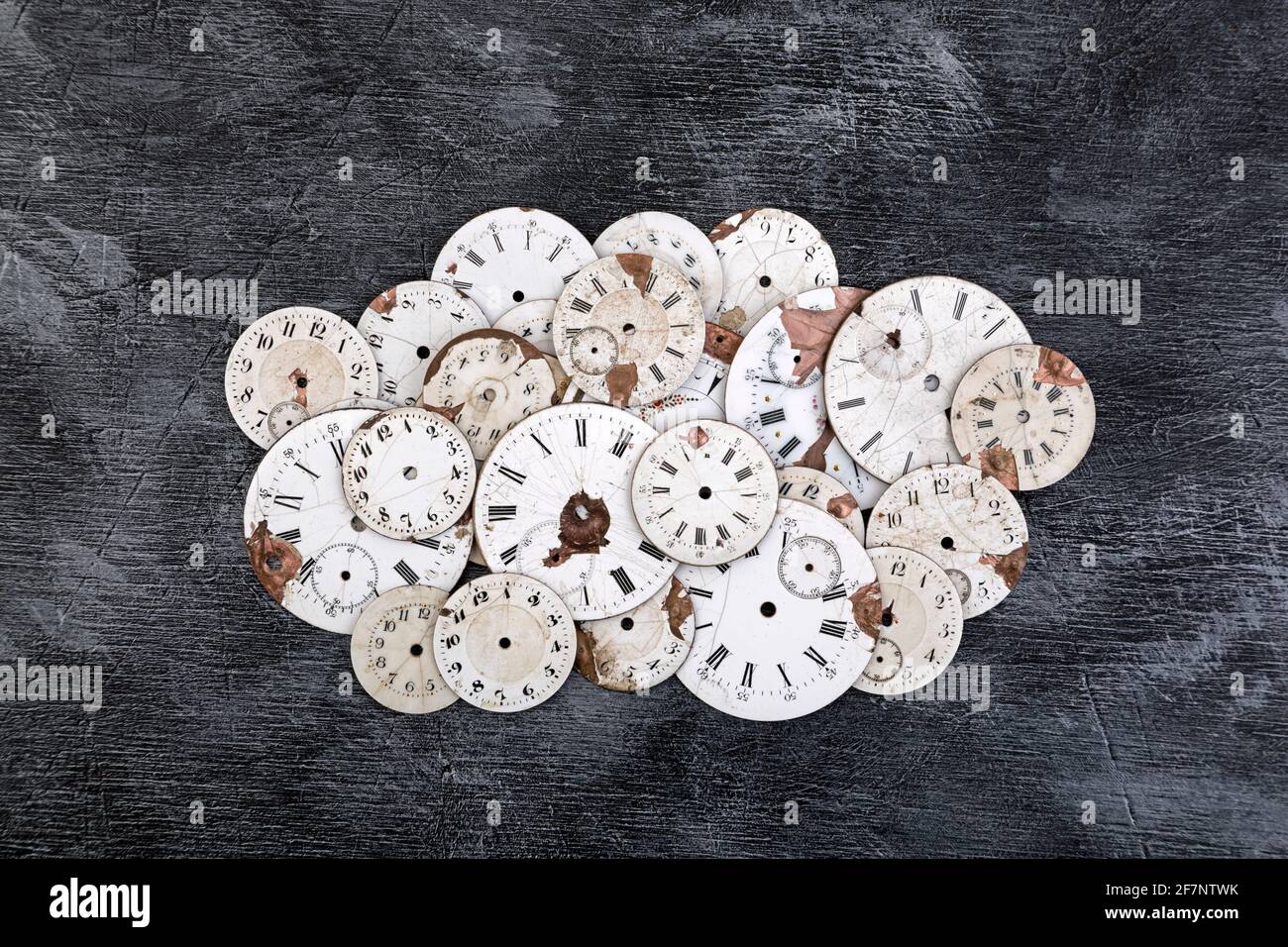 Group of damaged antique watch faces Stock Photo - Alamy