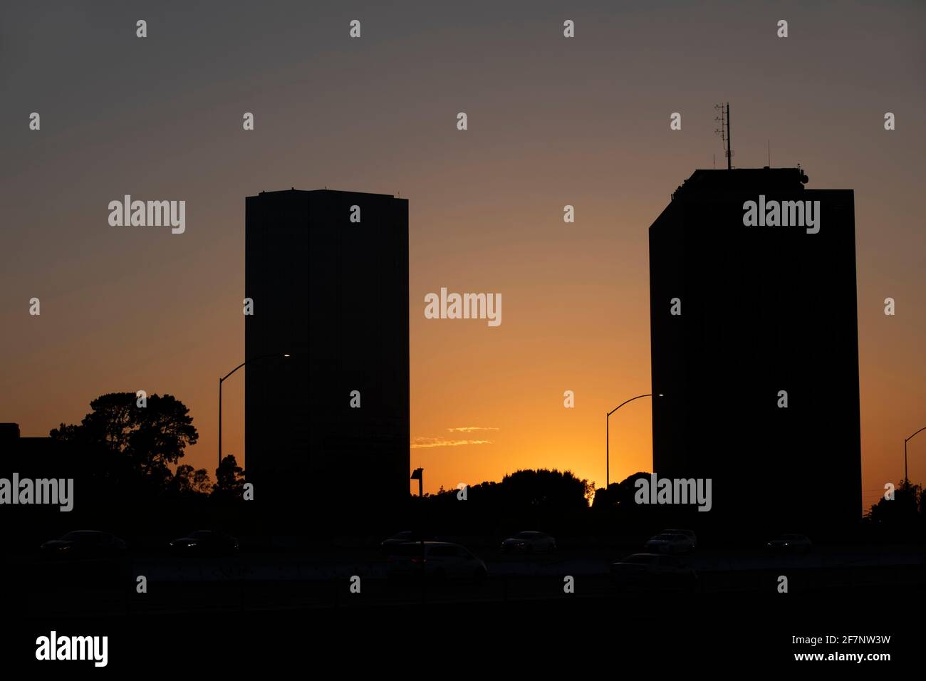 Sunset silhouette view of the downtown skyline of Oxnard, California ...