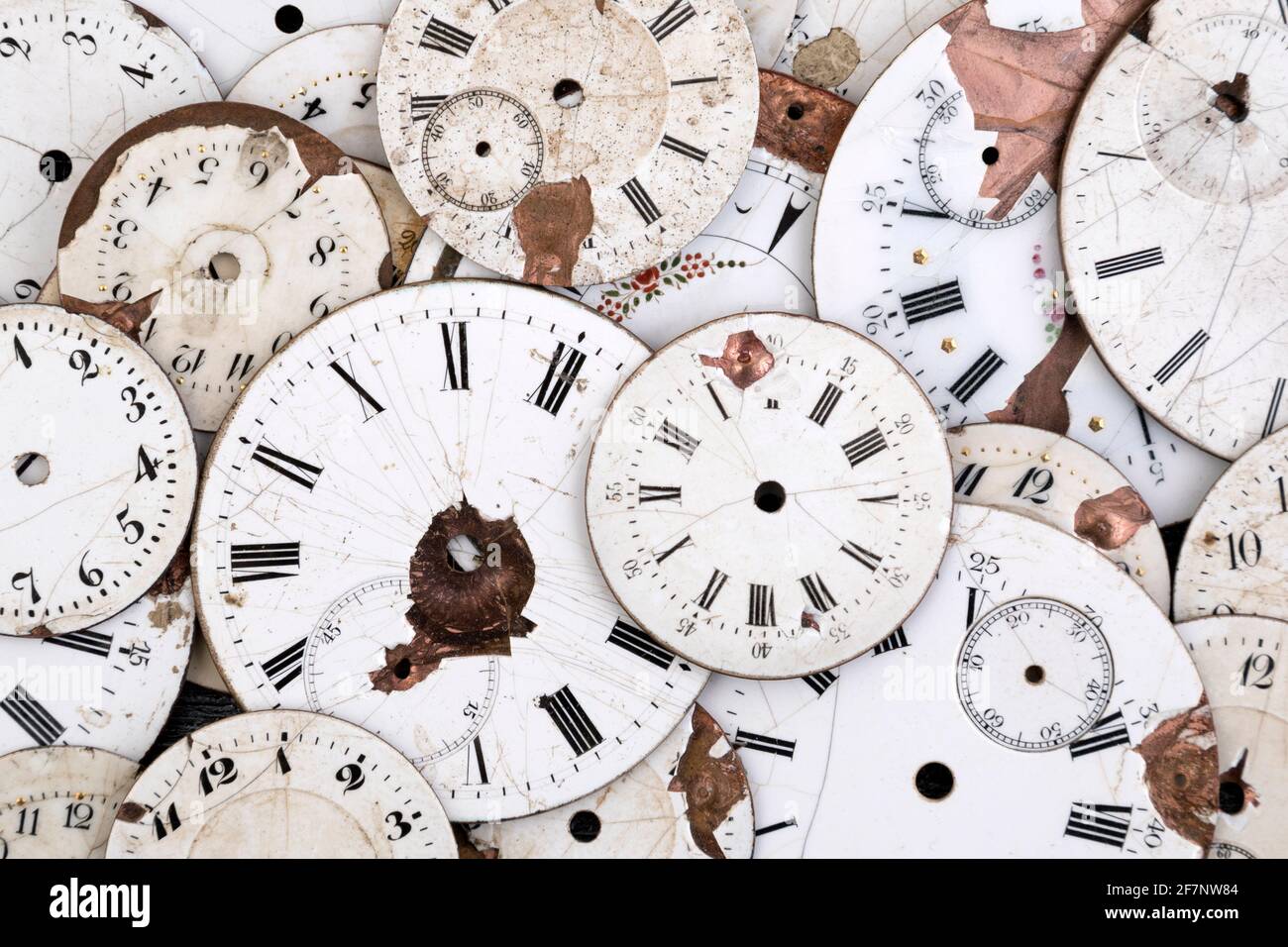 Group of damaged antique watch faces Stock Photo - Alamy