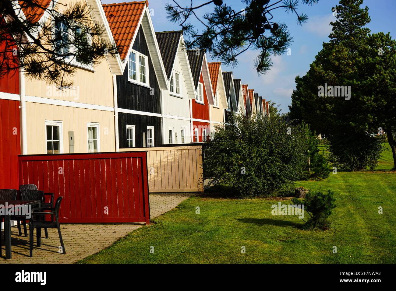 wooden townhouses as holiday homes in denmark Stock Photo - Alamy