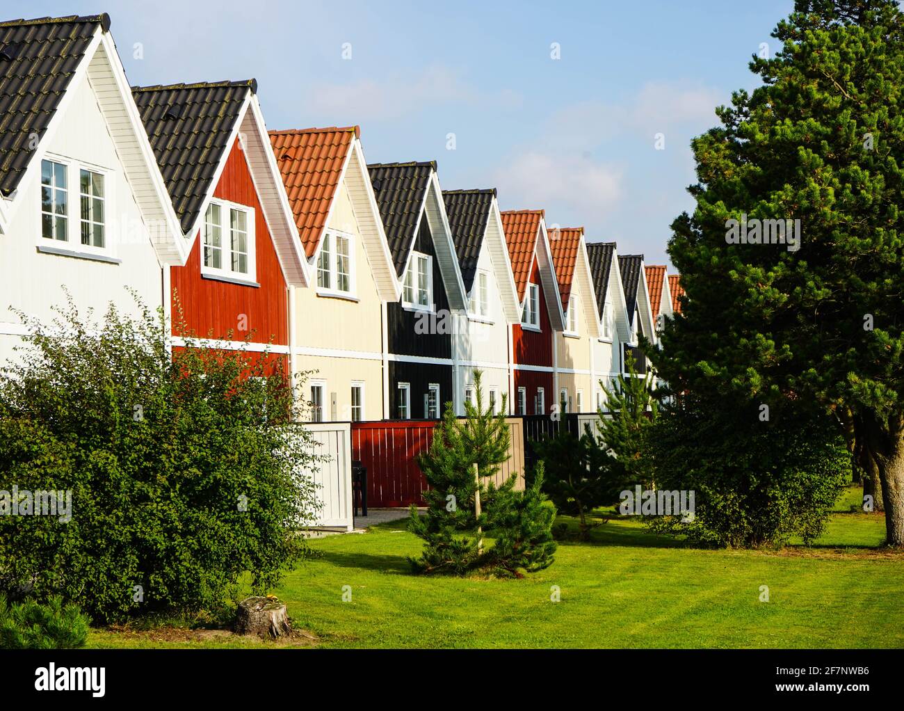 wooden townhouses as holiday homes in denmark Stock Photo - Alamy