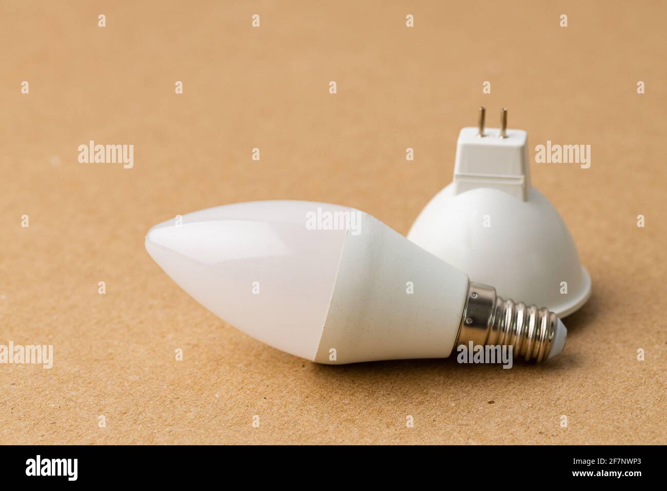 Light bulb on craft paper background close up Stock Photo - Alamy