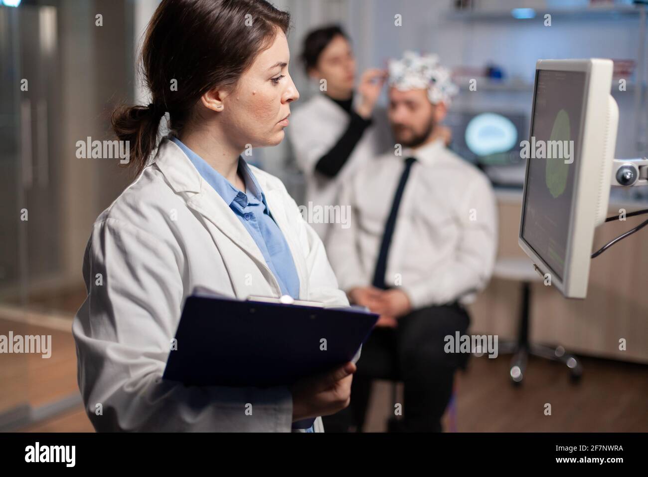 Doctor patient electrodes head monitor hi-res stock photography and ...