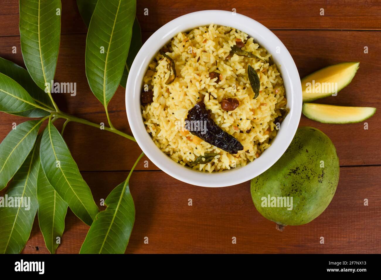 Delicious mango rice or mamidikaya pulihora homemade prepared during ...