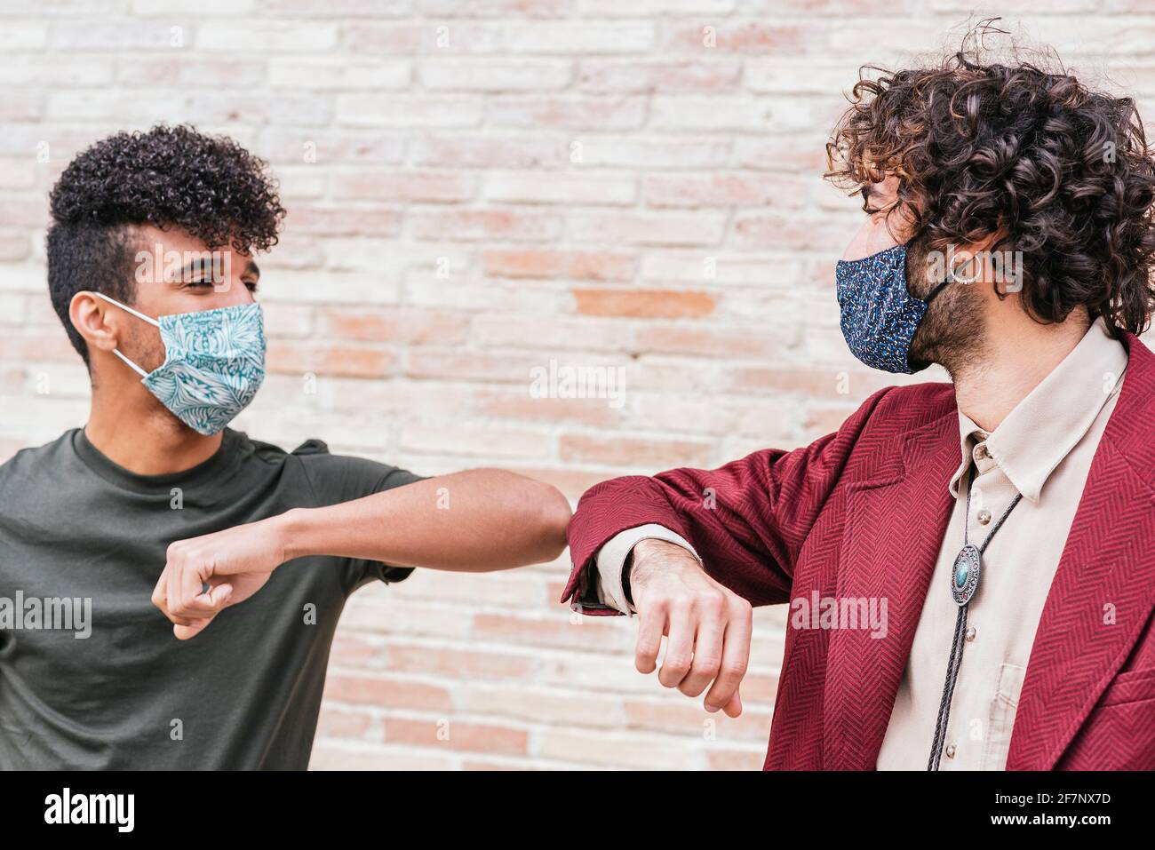 Friends greeting each other hi-res stock photography and images - Alamy