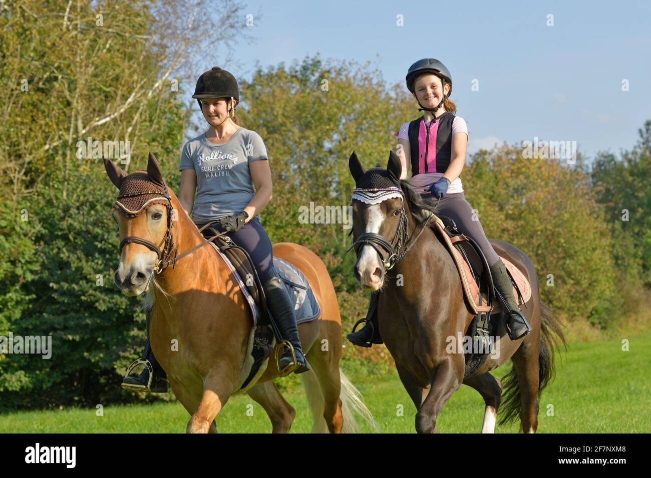 Hacking out, mother and daughter Stock Photo - Alamy
