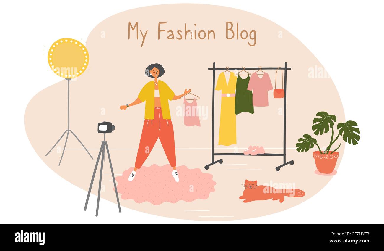 Fashion blogger. Young woman is recording video for her followers. Girl ...