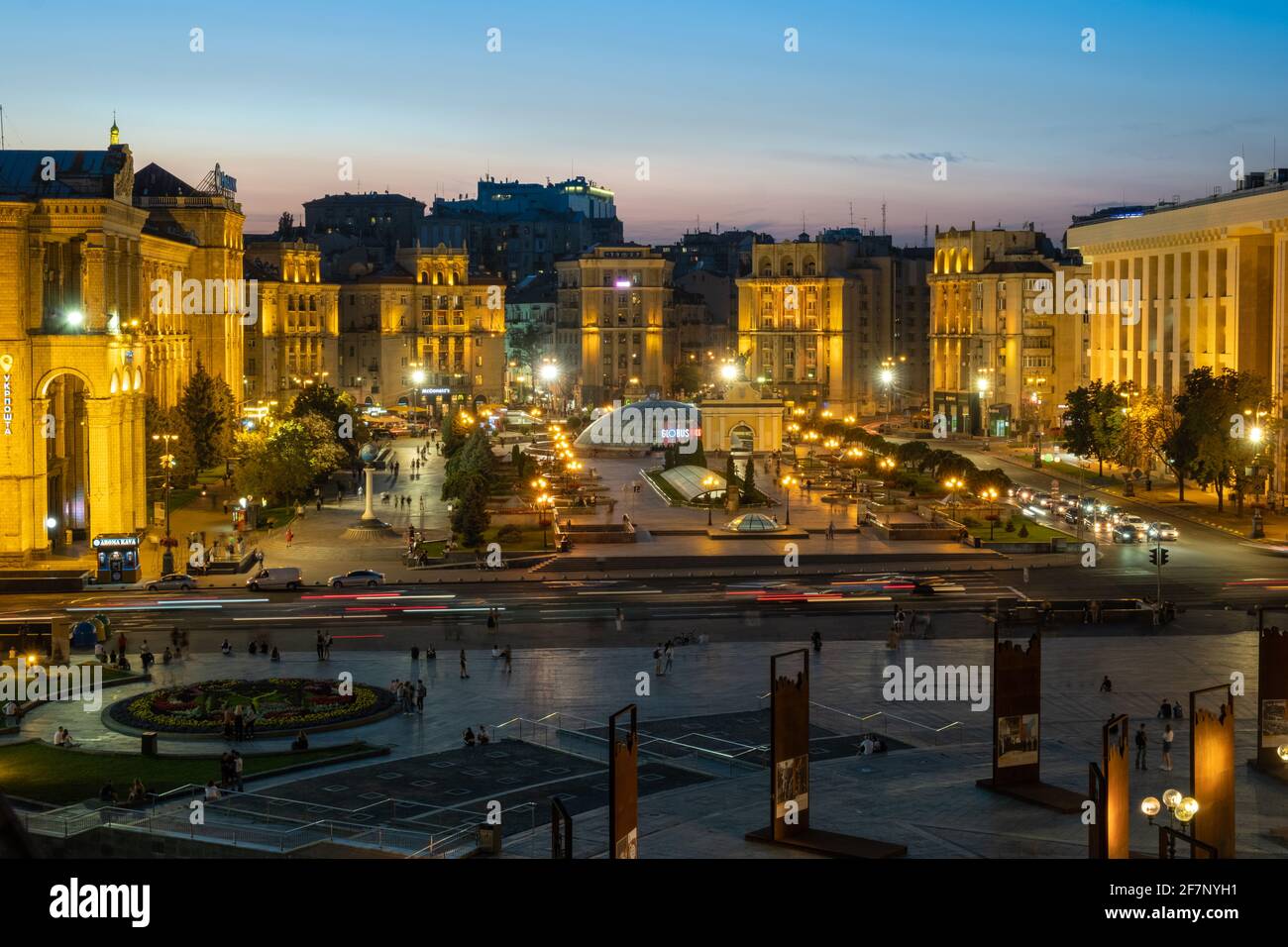 Wide, elevated shot of Maidan Square in Kiev during evening twilight ...