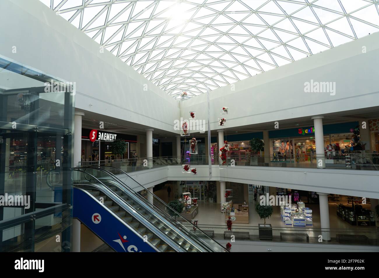 Grodno, Belarus - April 07, 2021: View on escalator in modern shopping ...