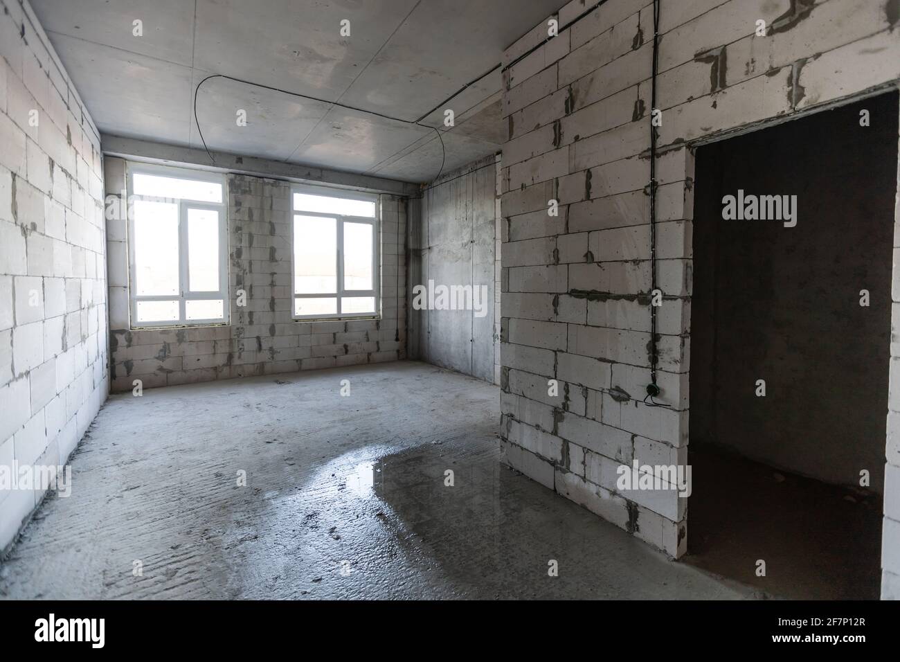 The Interior of the new room without finishing in the newly built high ...