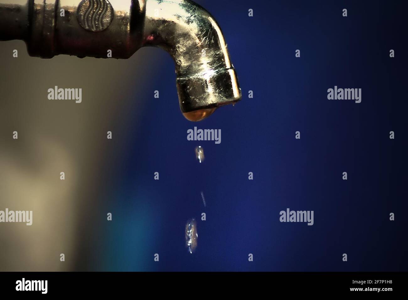 Water drops from a water tap at a house in Jakarta, Indonesia. Global ...