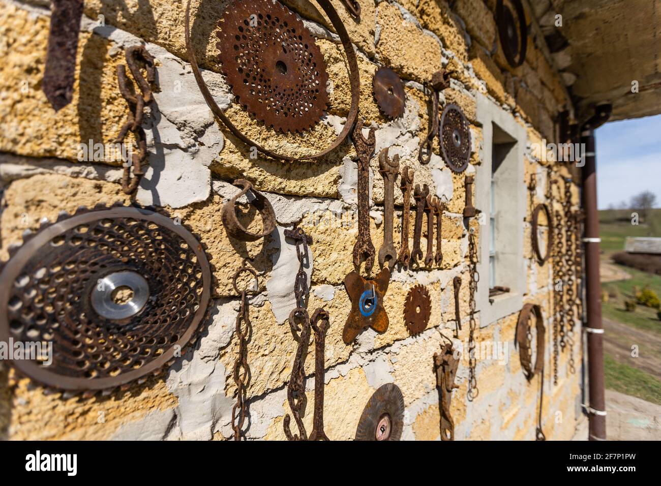 Old tools and wheels in a barn Stock Photo - Alamy