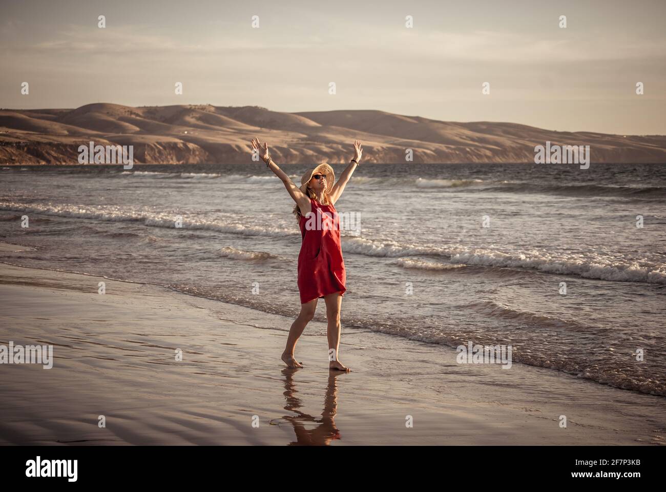 Mature woman in red dress hi-res stock photography and images - Alamy