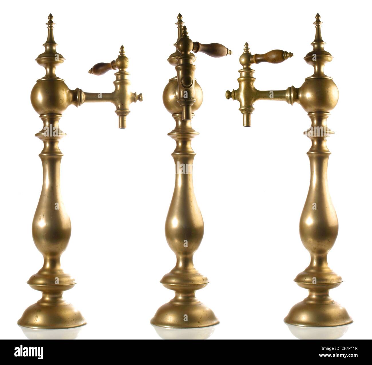 Old golden beer dispenser isolated on white Background Stock Photo - Alamy